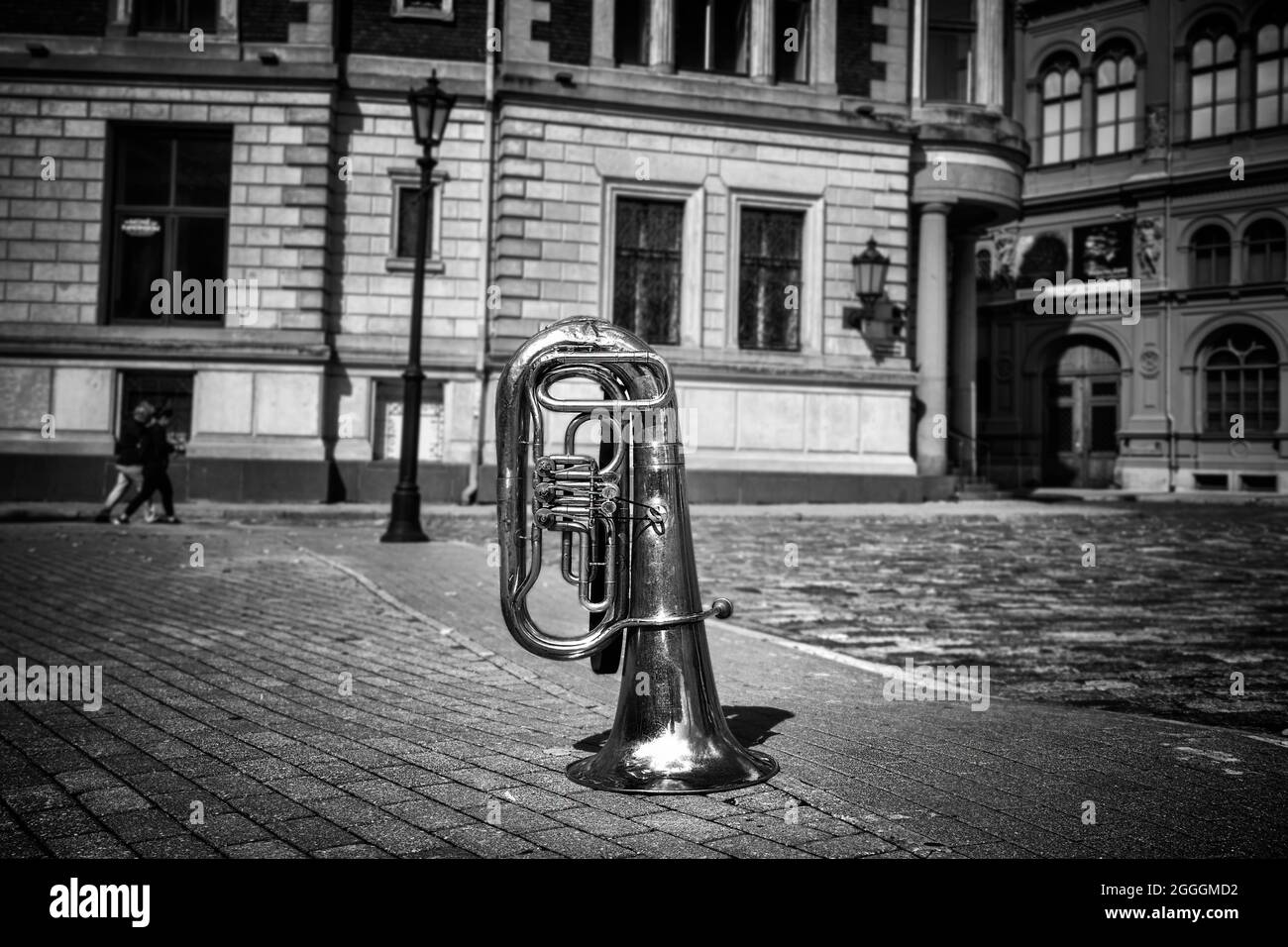 Riga, Latvia. August 2021. a trombone resting on the sidewalk in a ...