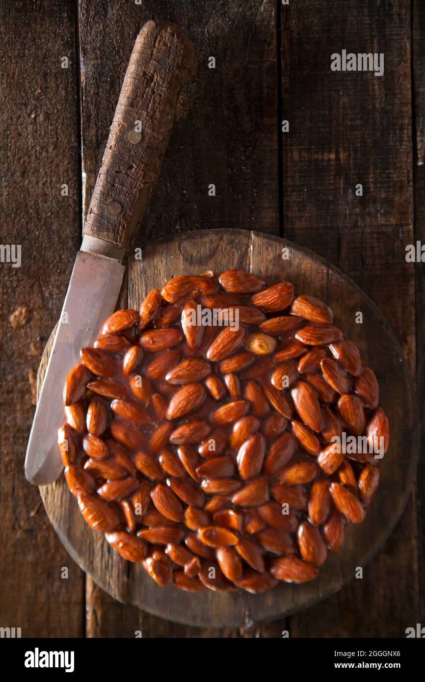 Typical and traditional sweet made from melted sugar and almonds Stock ...