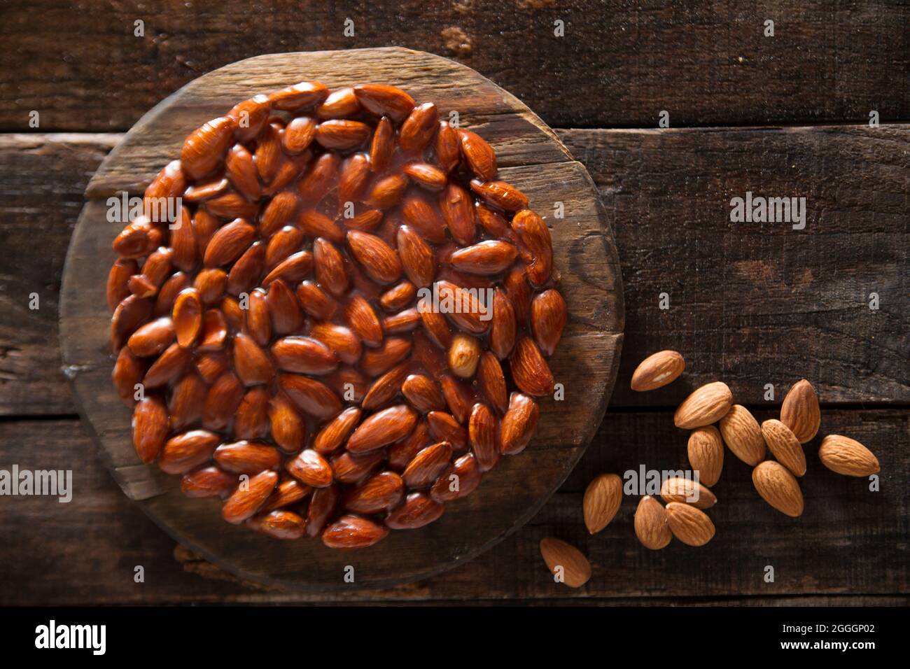 Typical and traditional sweet made from melted sugar and almonds Stock ...