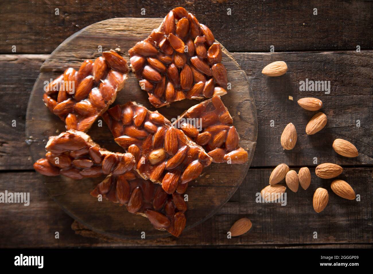 Typical and traditional sweet made from melted sugar and almonds Stock ...