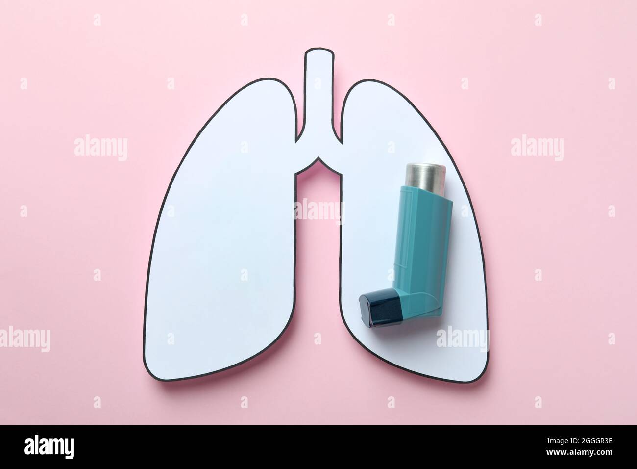 Decorative lungs and inhaler on pink background Stock Photo - Alamy