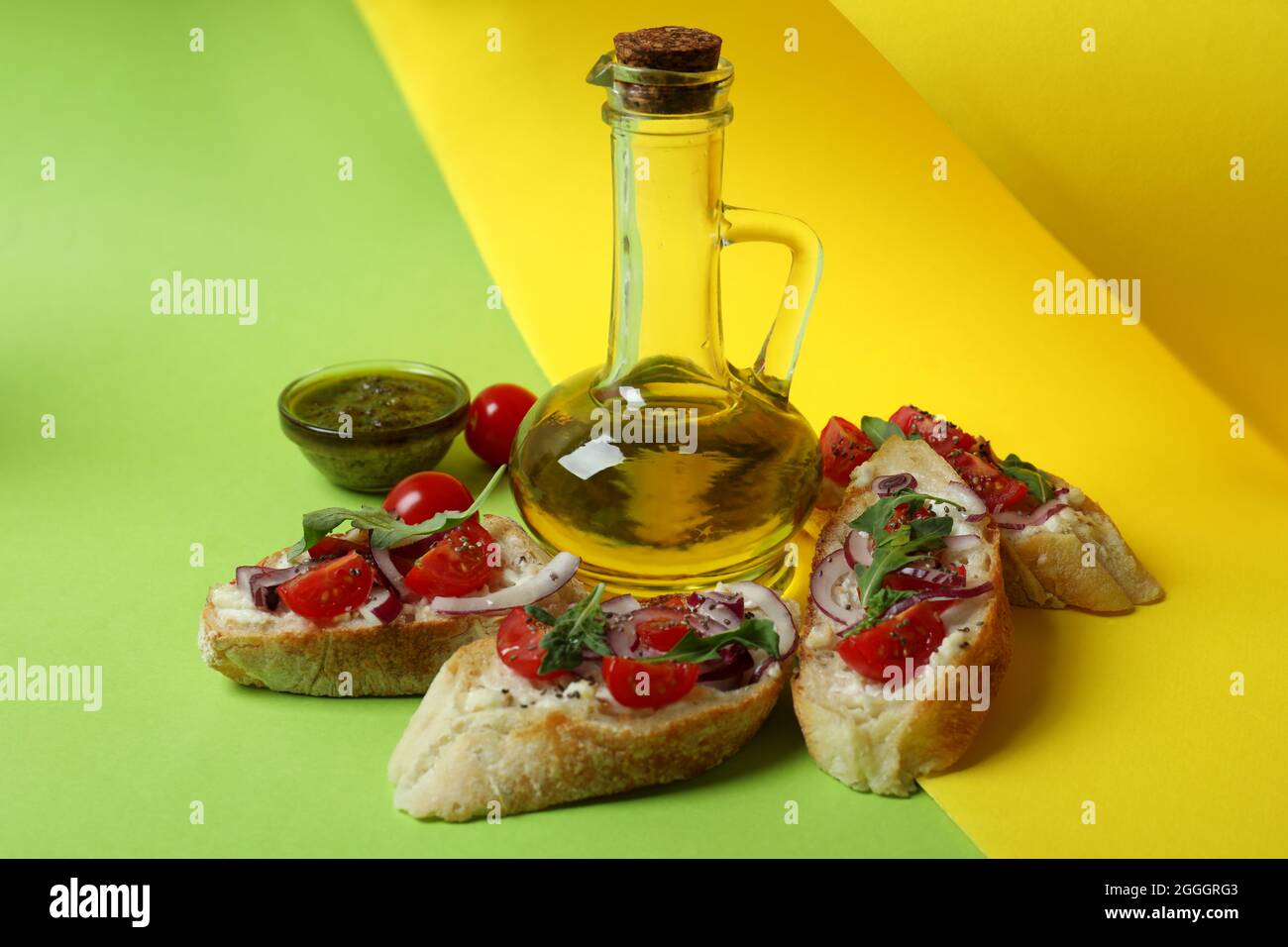 Delicious italian snacks bruschetta on two tone background Stock Photo ...
