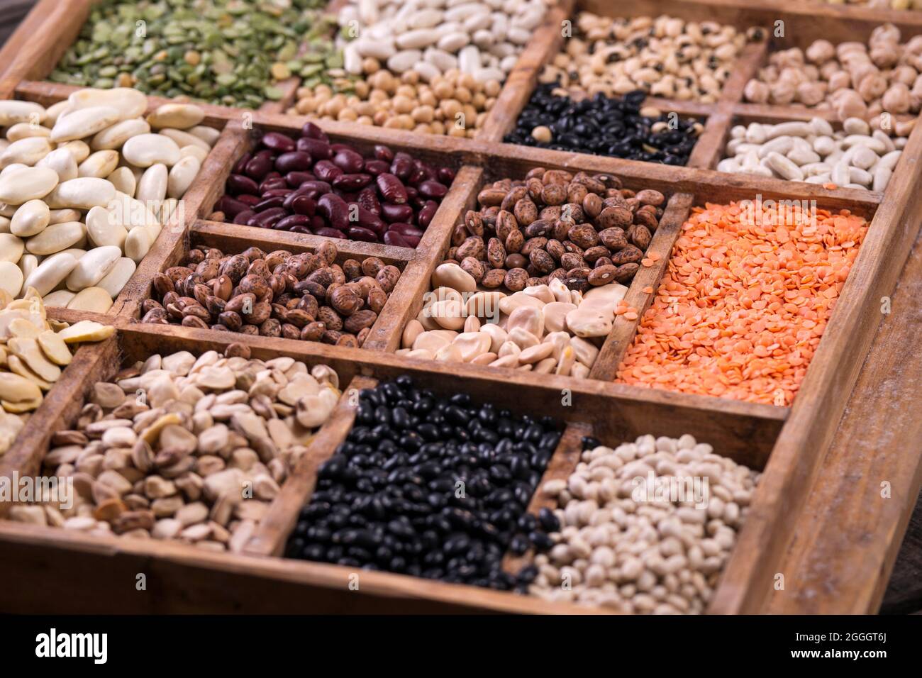 Presentation of mixed seeds of pulses in a display of wood Stock Photo ...