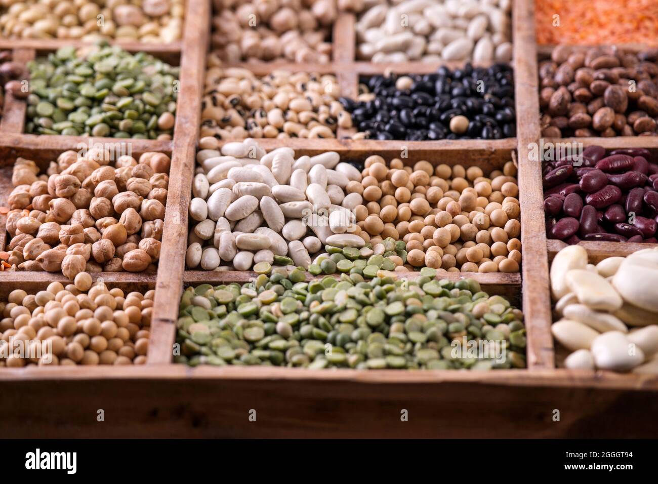 Presentation of mixed seeds of pulses in a display of wood Stock Photo ...
