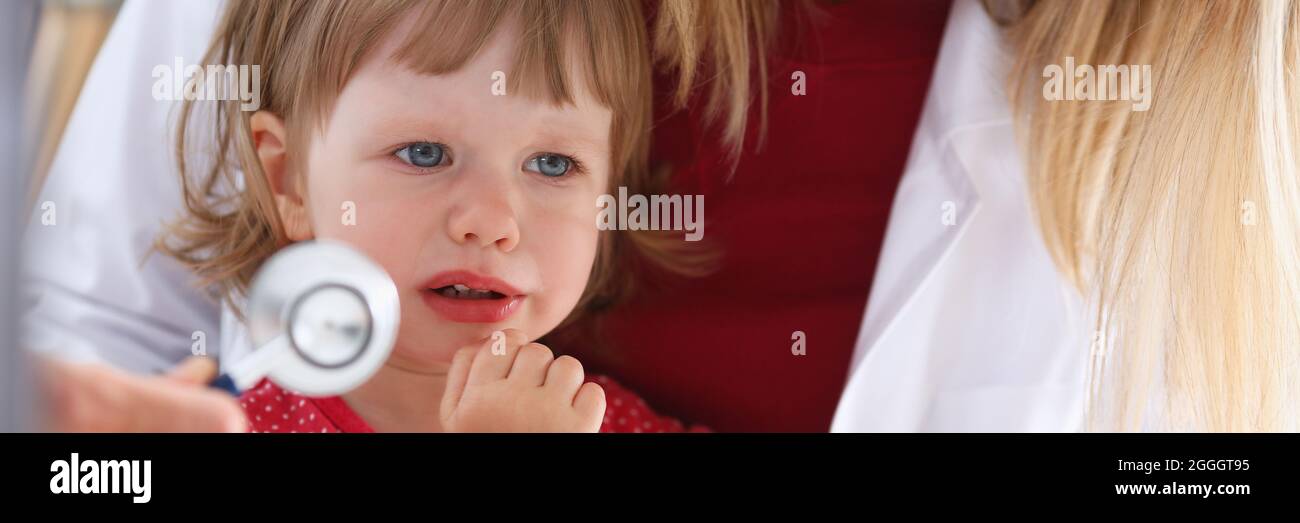 Little scared child at doctor reception Stock Photo - Alamy