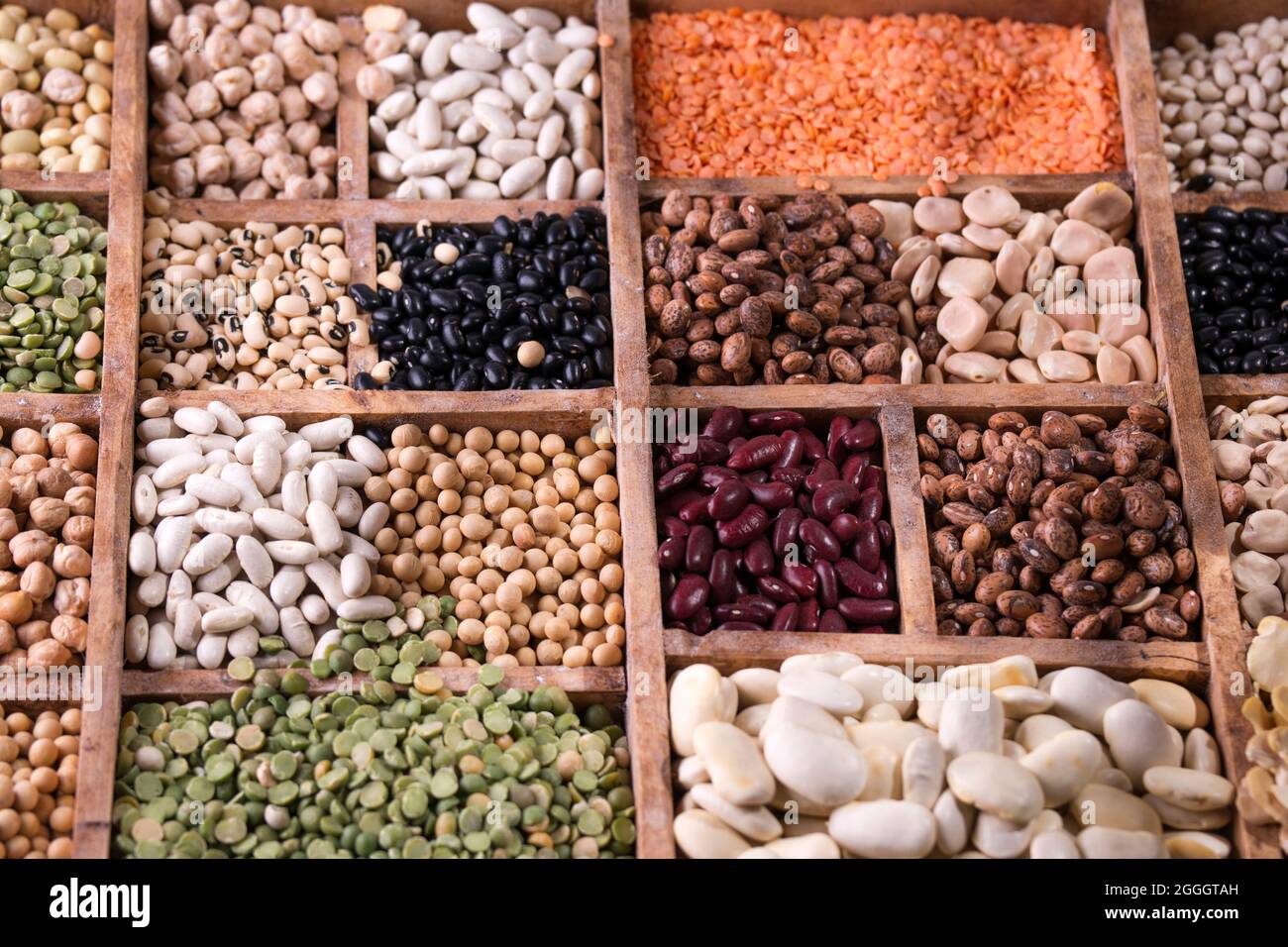 Presentation of mixed seeds of pulses in a display of wood Stock Photo ...