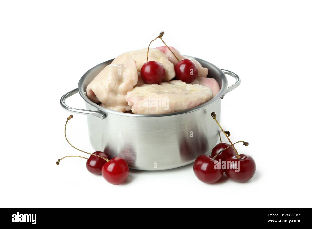 Pot with pierogi with cherry isolated on white background Stock Photo ...