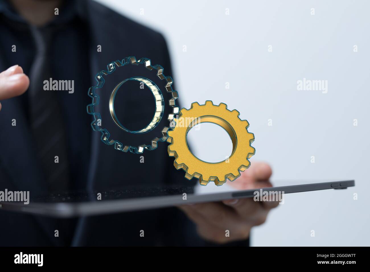Closeup of a 3D rendering of engineering and design gears floating on a tablet Stock Photo - Alamy