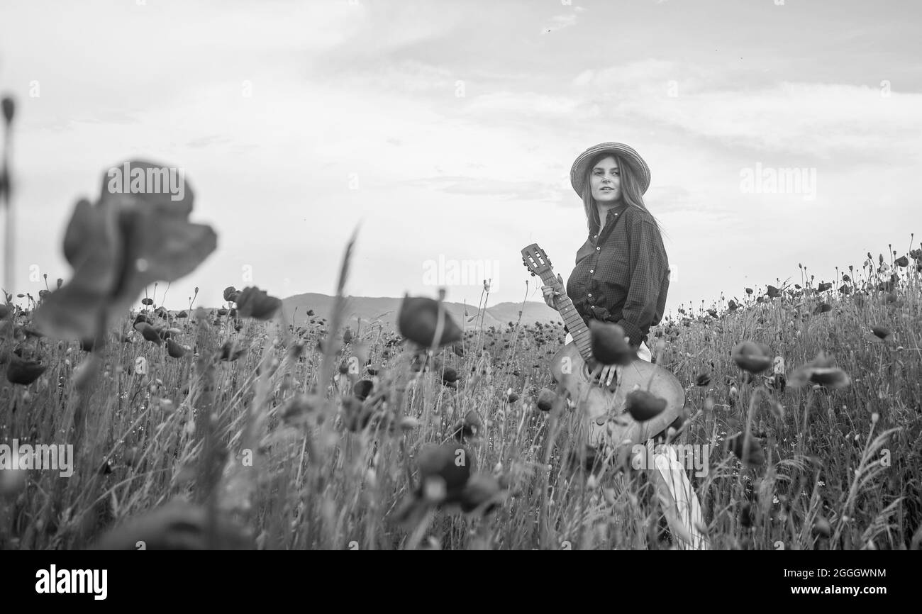 woman walking in poppy flower field during Spring, nature beauty Stock ...