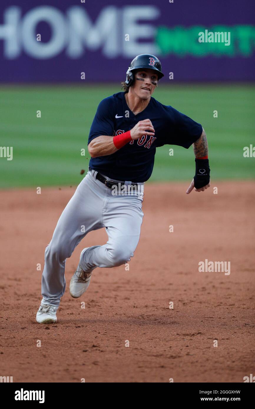 Boston Red Sox center fielder Jarren Duran #40 rounds third base during an MLB regular season ...
