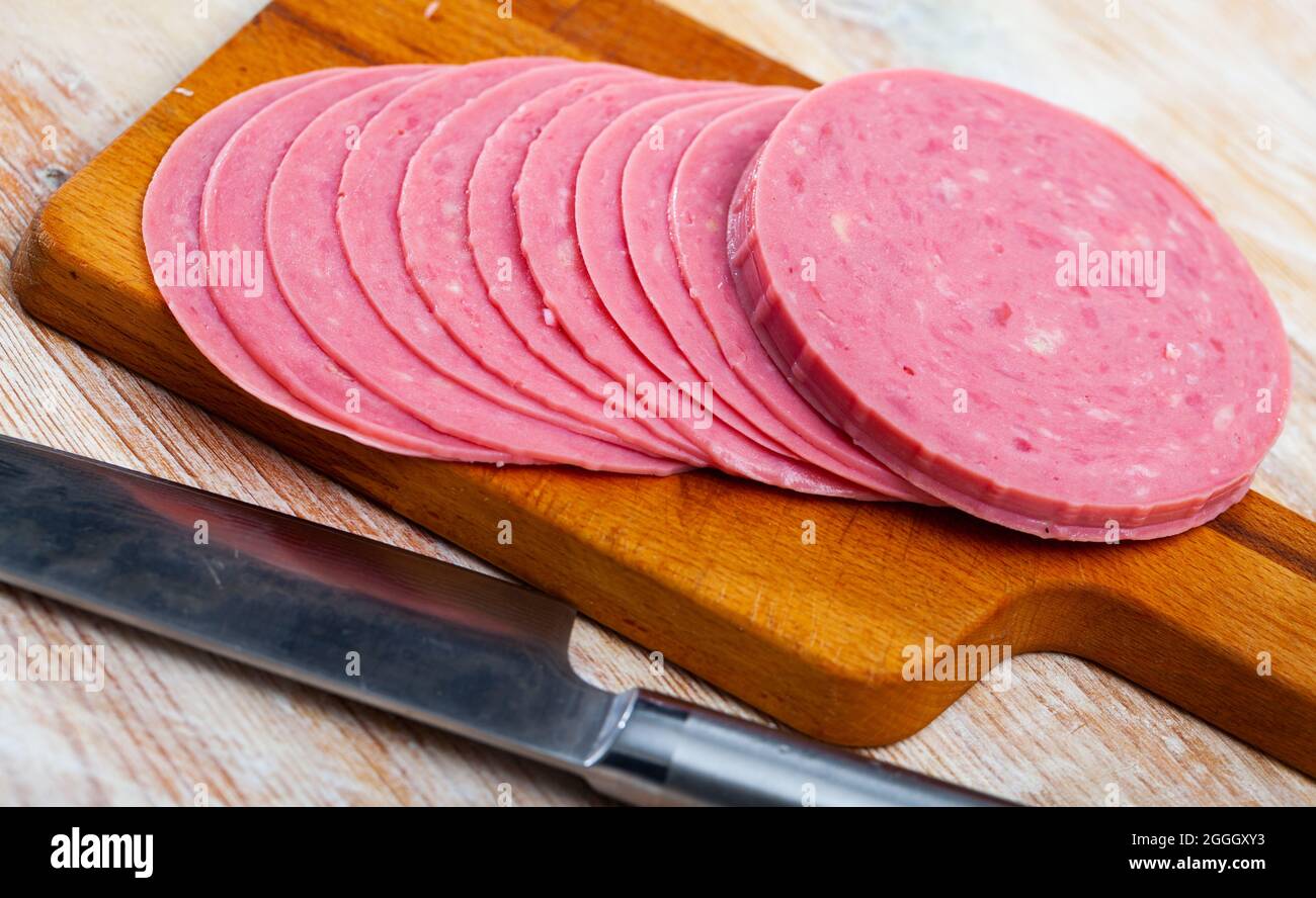 Sliced turkey mortadella sausage Stock Photo - Alamy