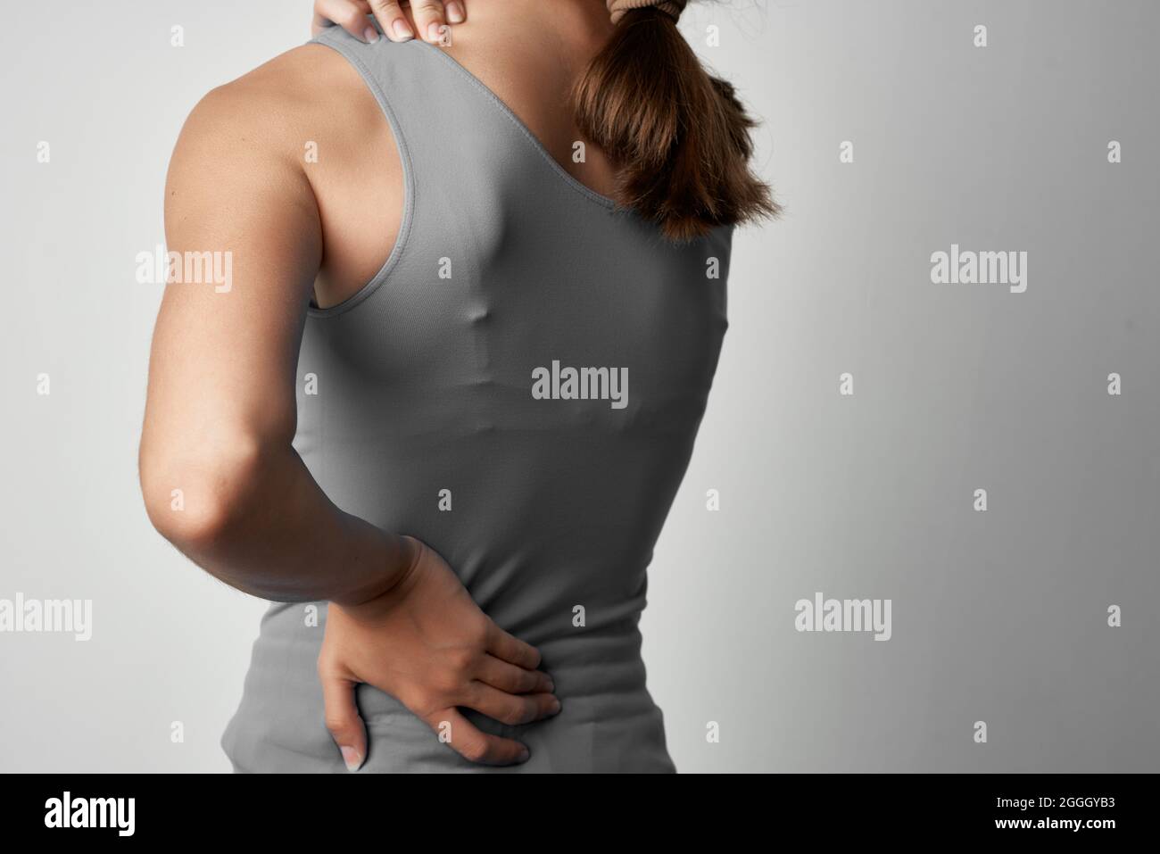 woman with back pain medicine treatment health problems Stock Photo - Alamy