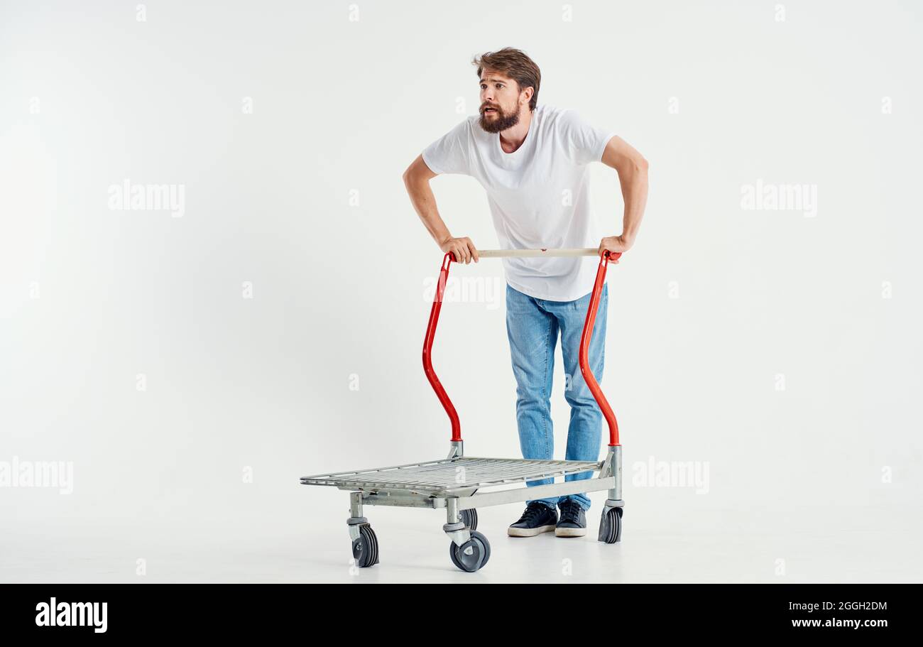 Man ride a cart entertainment shipping isolated background Stock Photo ...