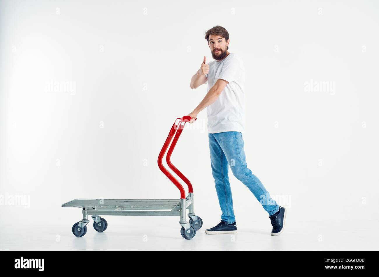 Man ride a cart entertainment shipping isolated background Stock Photo ...