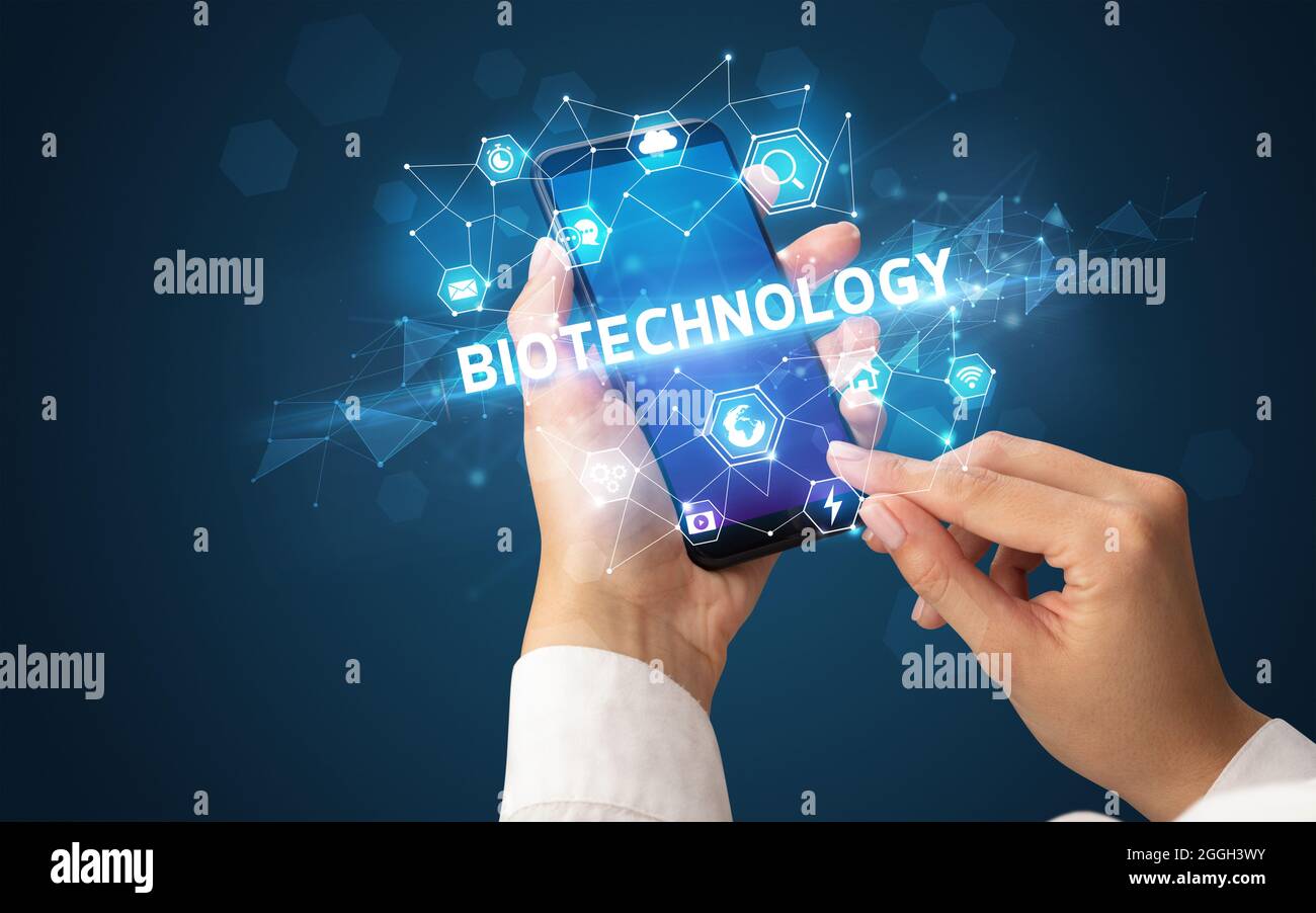 Hand using smartphone with technology concept Stock Photo - Alamy