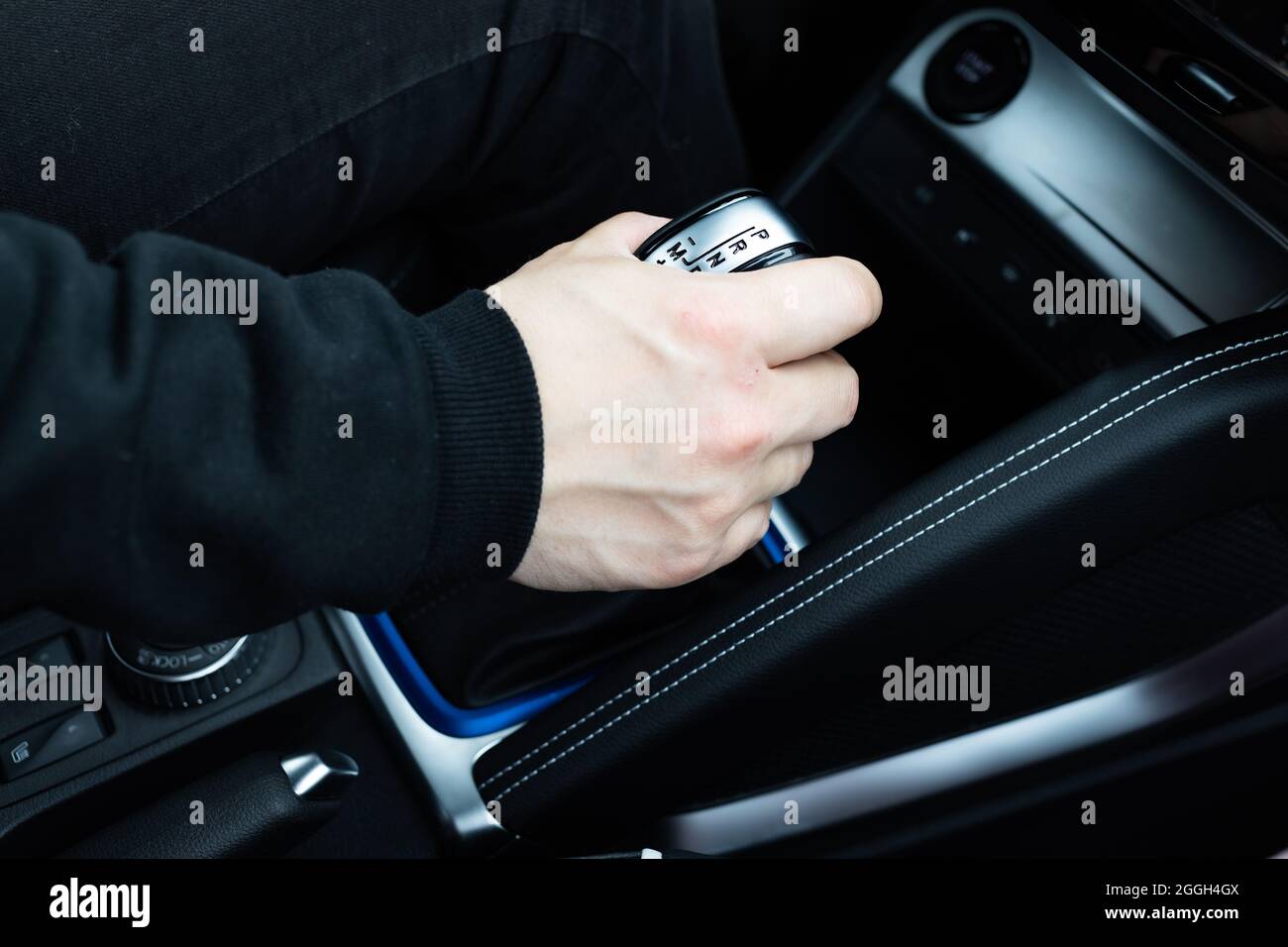 Man hand on an automatic gear stick hi-res stock photography and images ...