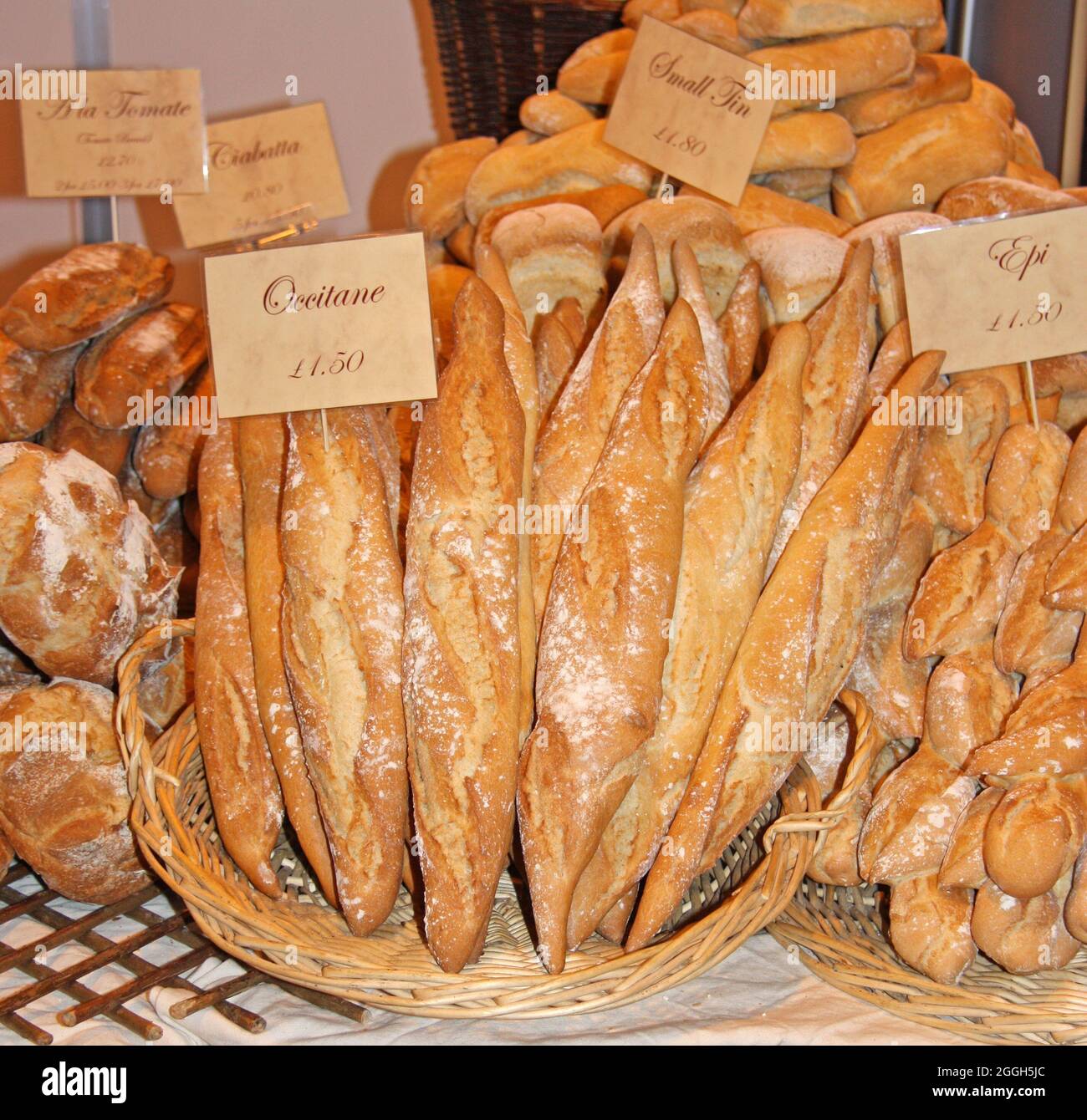 A Display of Various Fresh Bread Loaves for Sale Stock Photo - Alamy