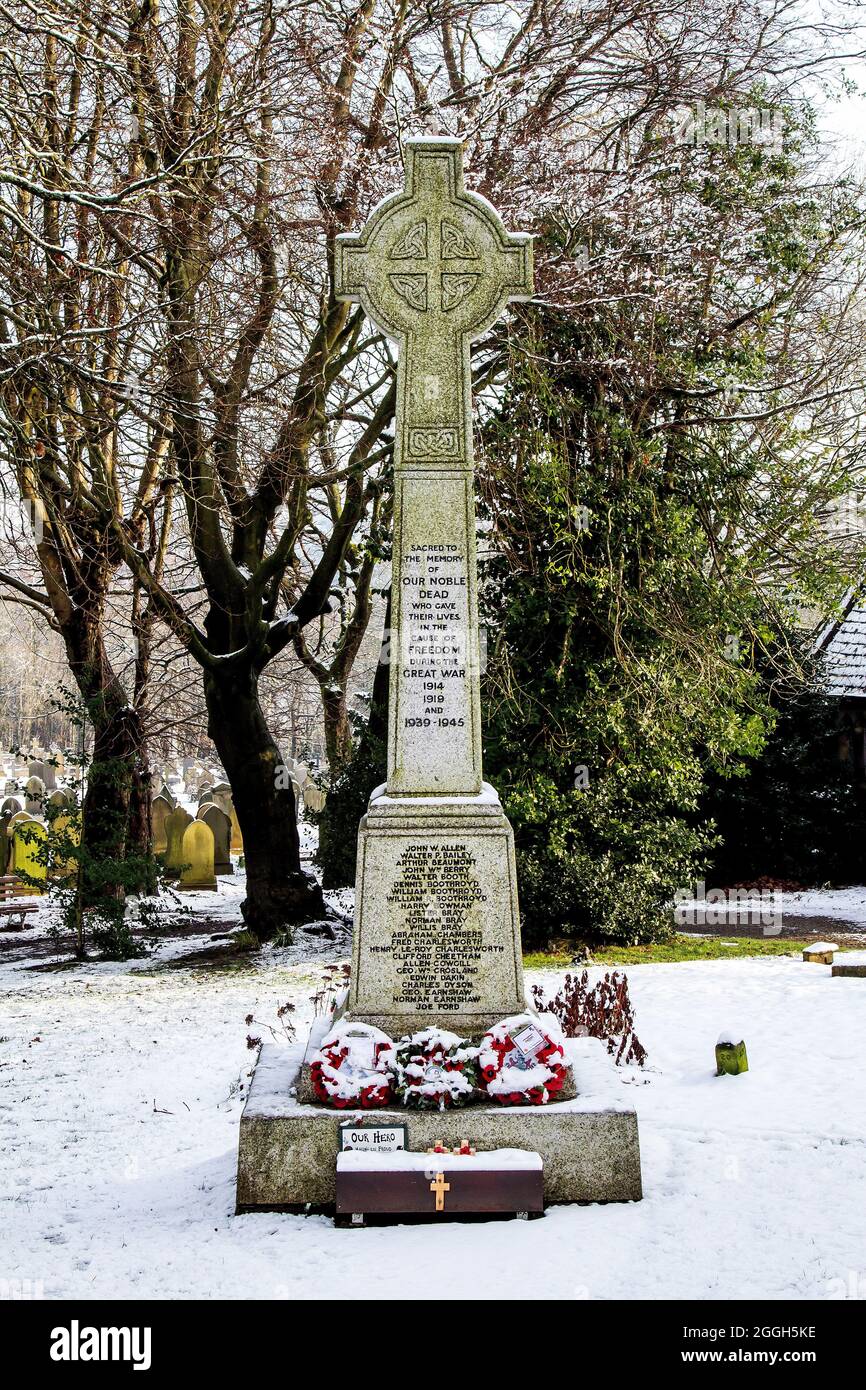 War Memorial in Honley Cemetery after snowfall Stock Photo - Alamy