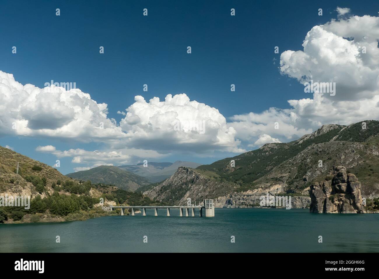 Granada in Spain: the turquoise waters of the Embalse de Canales Stock ...