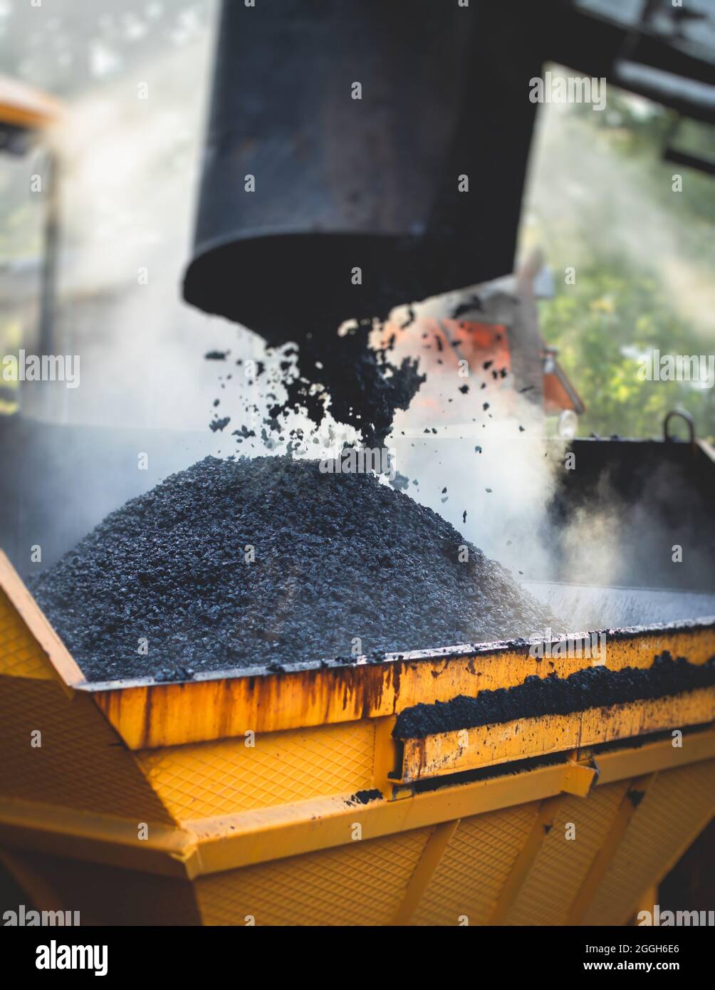 Process of asphalting, blacktopping and paving, asphalt paver machine ...