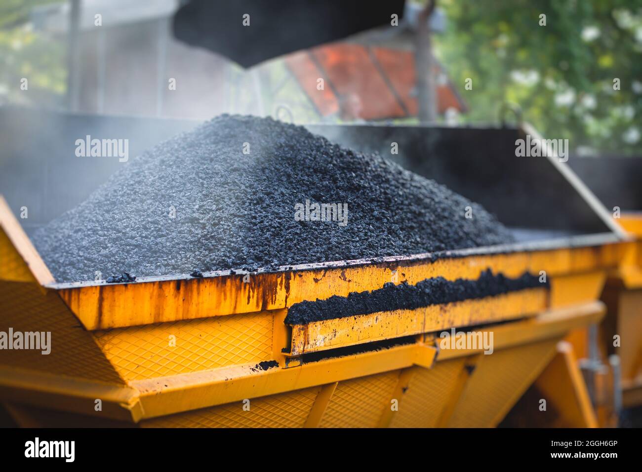 Process of asphalting, blacktopping and paving, asphalt paver machine ...