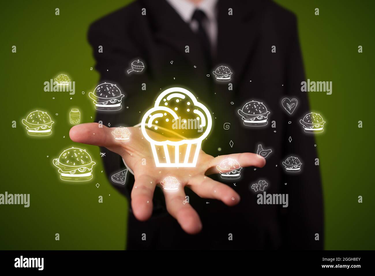 Hand holding food related icons Stock Photo - Alamy