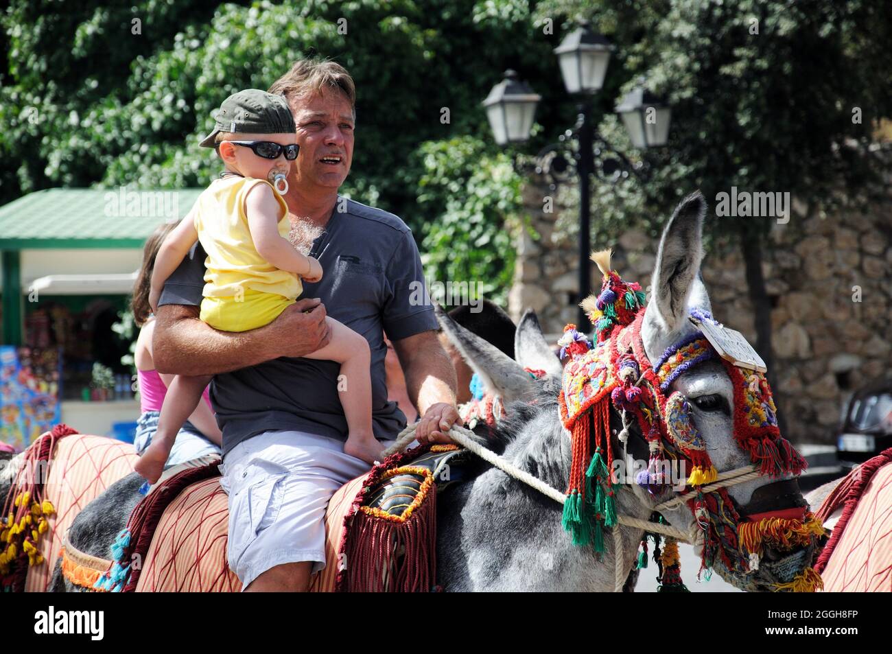 Children riding a donkey hi-res stock photography and images - Alamy