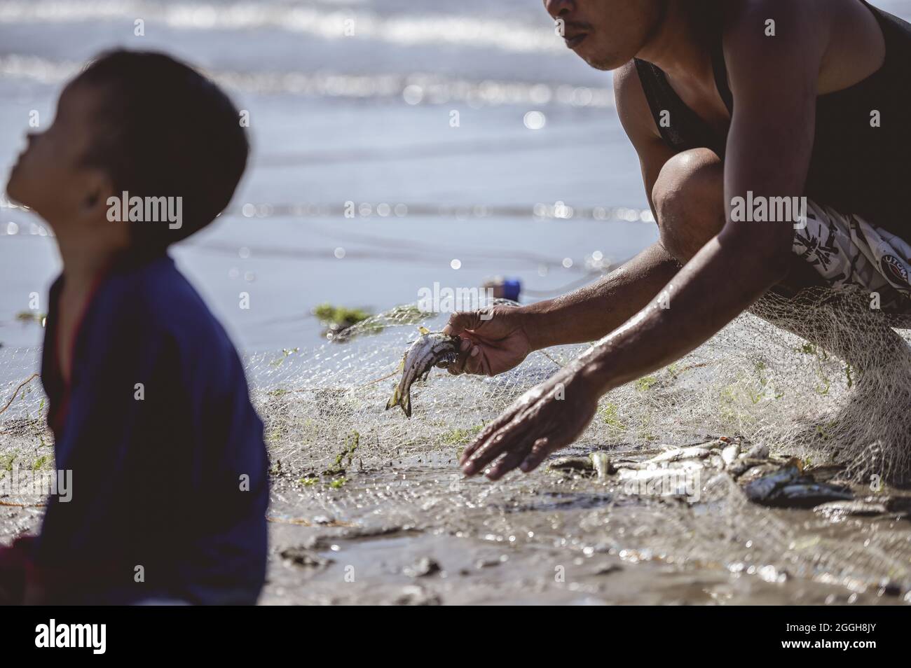 BACOLOD, PHILIPPINES - Mar 03, 2019: A Filipino fishing village on the ...