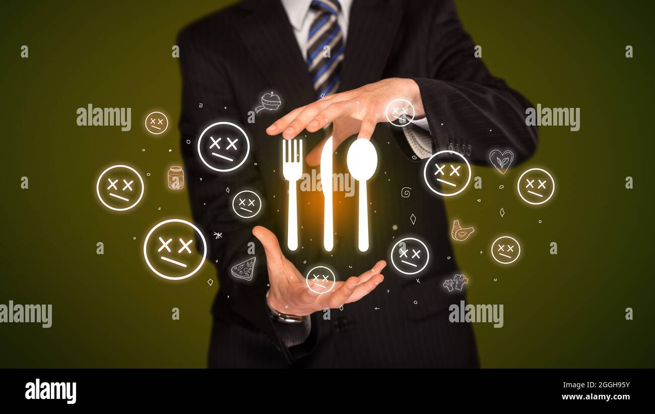 Hand holding food related icons Stock Photo - Alamy