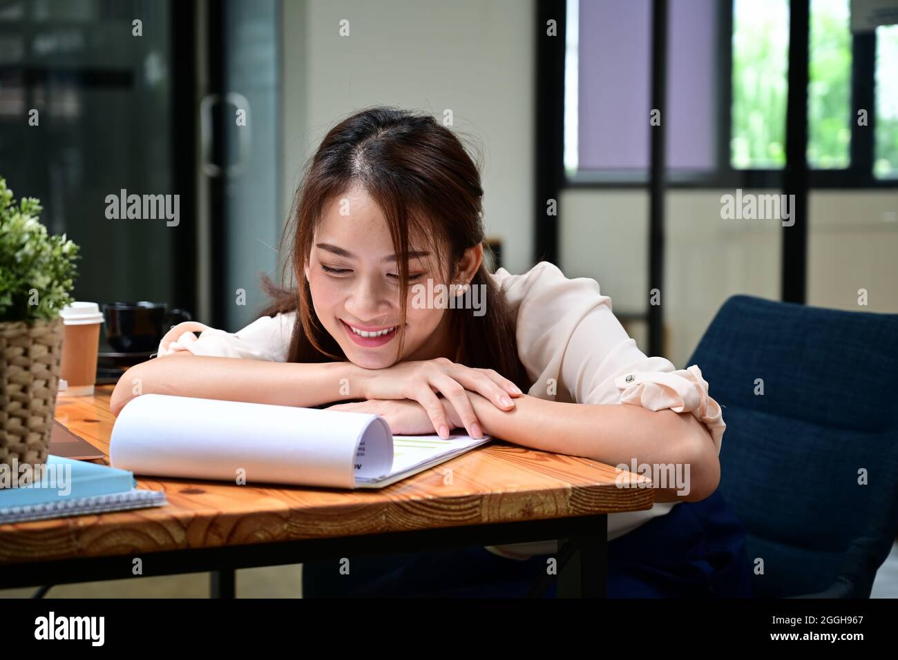 Female office worker laying hi-res stock photography and images - Alamy