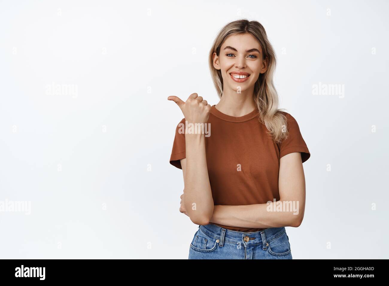 Woman points at teeth hi-res stock photography and images - Alamy