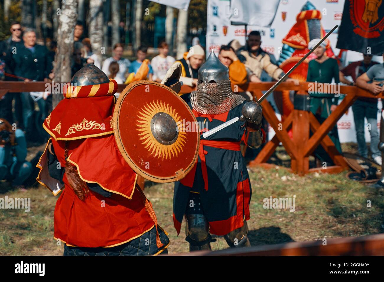 Fights among women in armor. Two females warrior fighting in ...