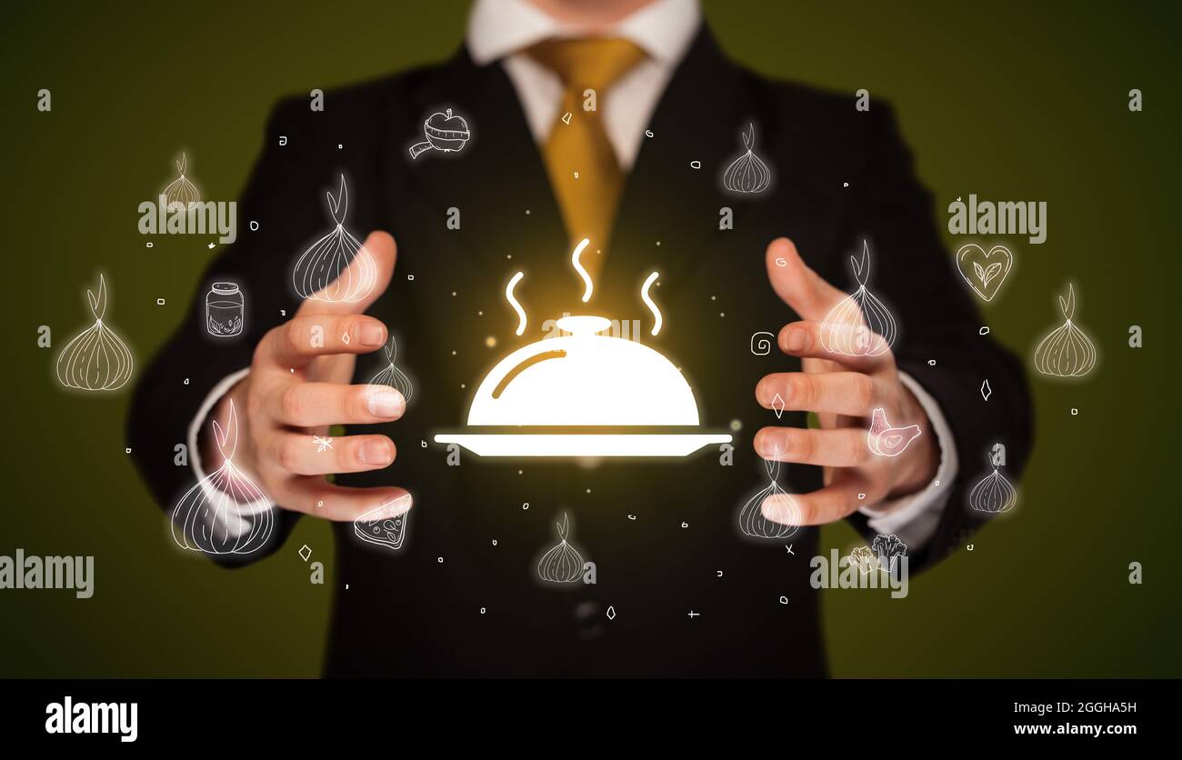 Hand holding food related icons Stock Photo - Alamy