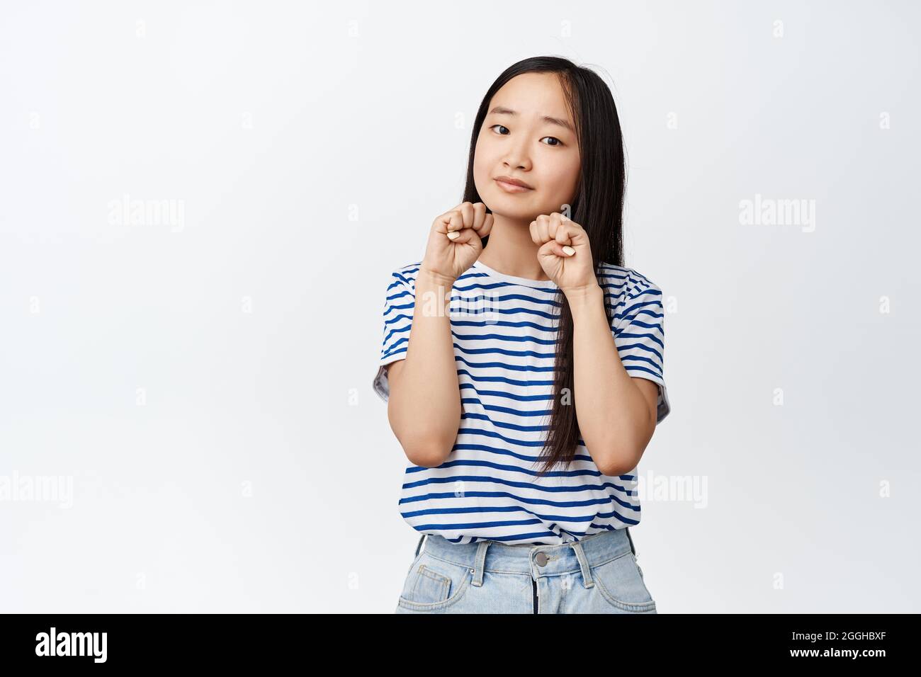 Cute asian girl posing with cat paws gesture, kawaii face expression ...