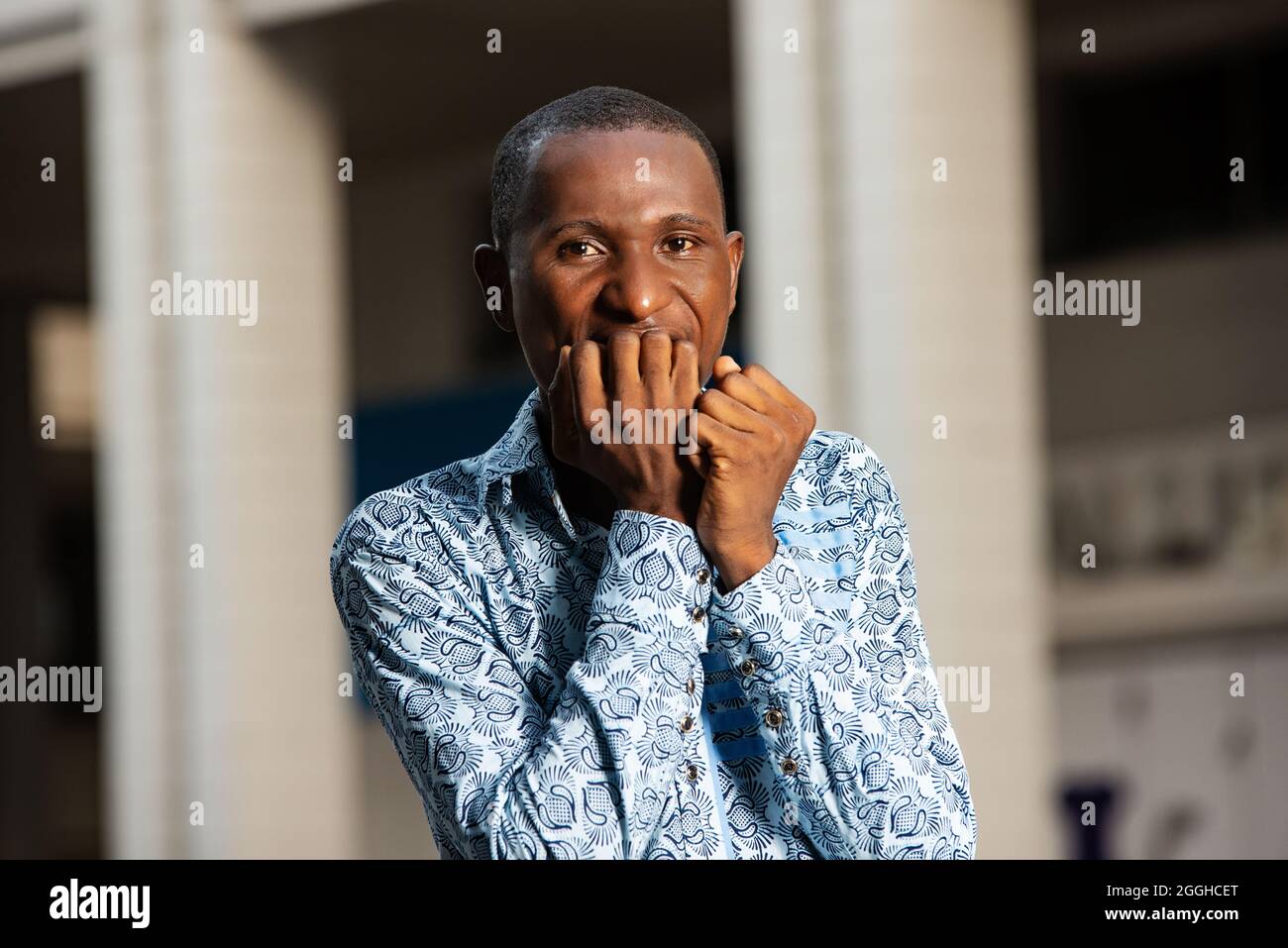Man biting fingernails on street hi-res stock photography and images ...