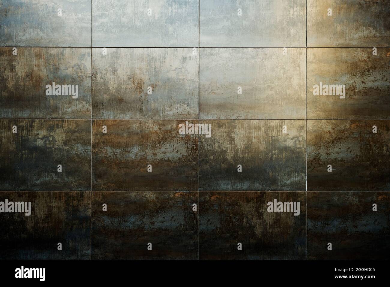 Modern distressed tiled wall with oxidized effect and grunge texture ...