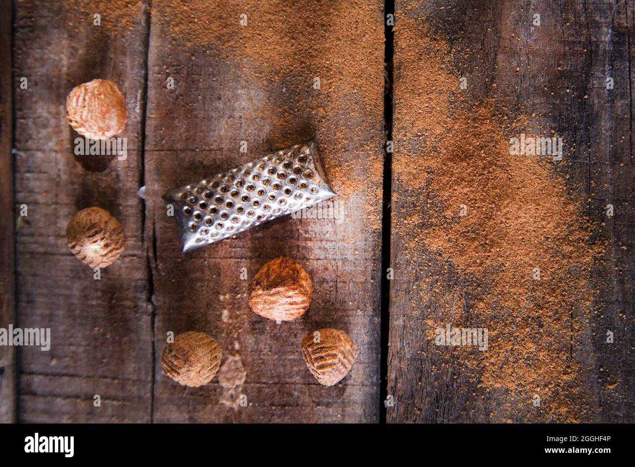 Detail of the grating of nutmeg flavor unique to particular foods and ...