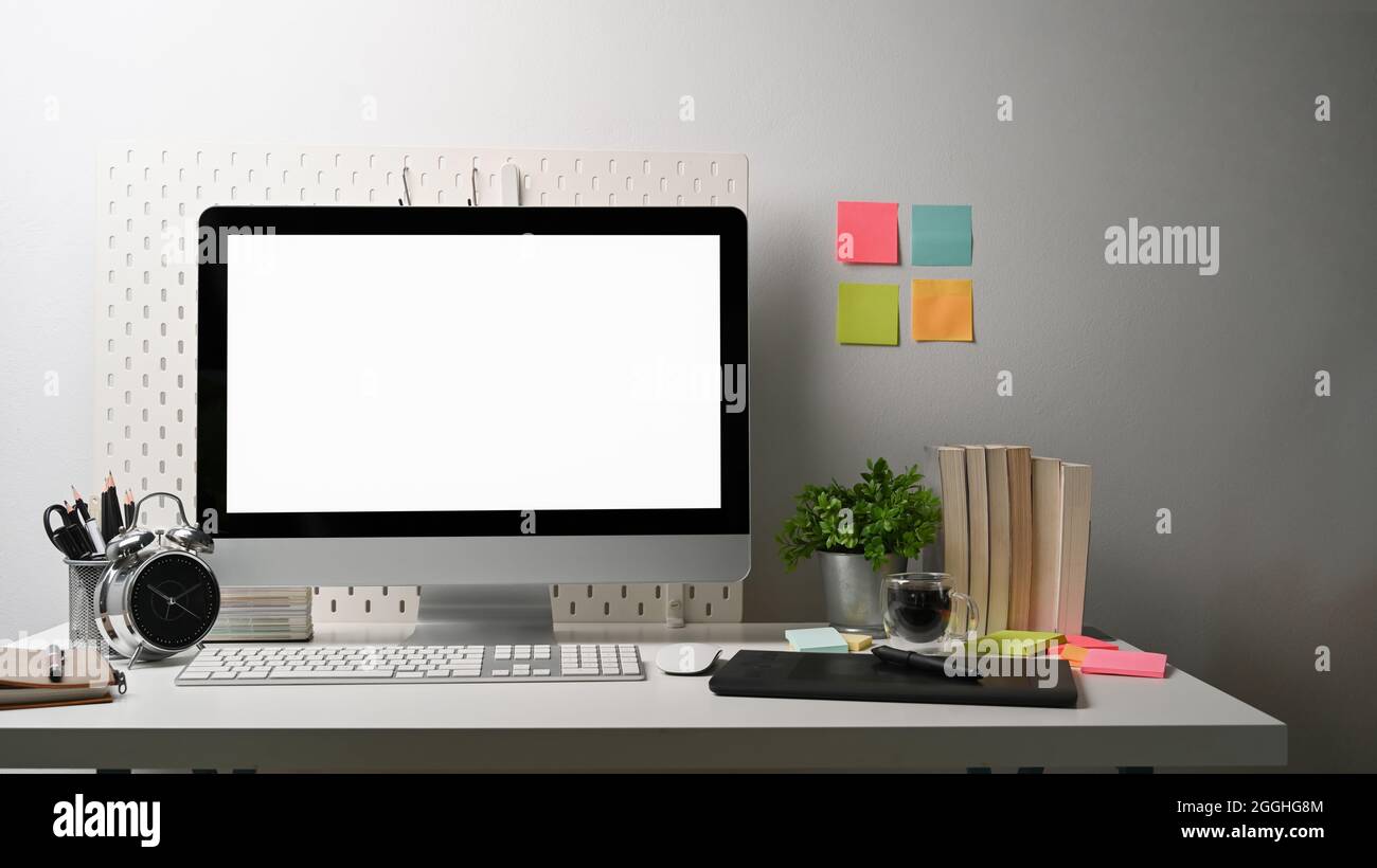 Front view computer with blank screen at modern workplace Stock Photo ...