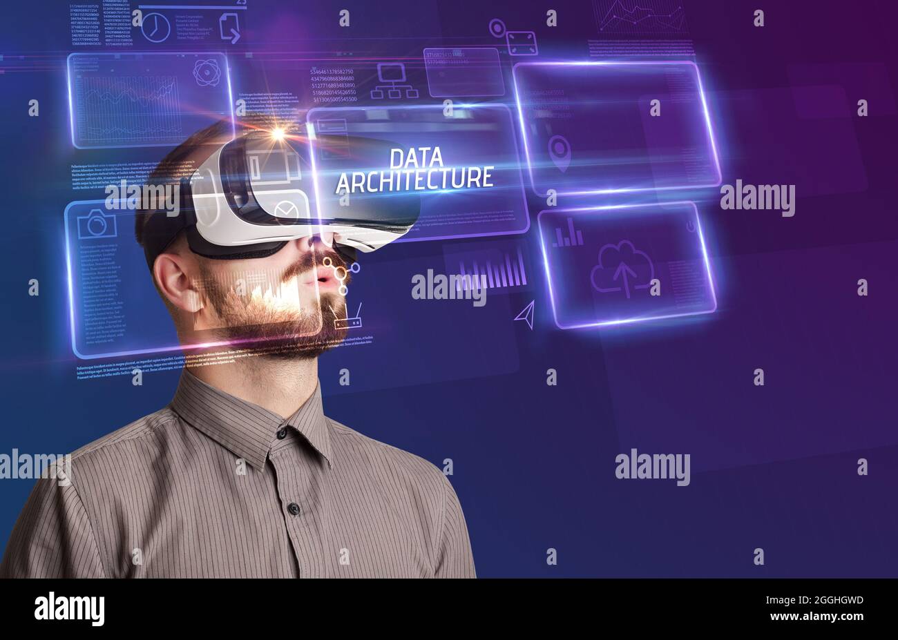 Businessman looking through Virtual Reality glasses, tech concept Stock ...