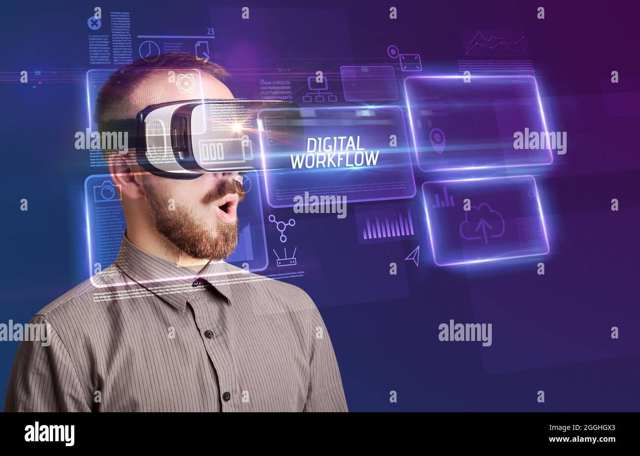 Businessman looking through Virtual Reality glasses, tech concept Stock ...