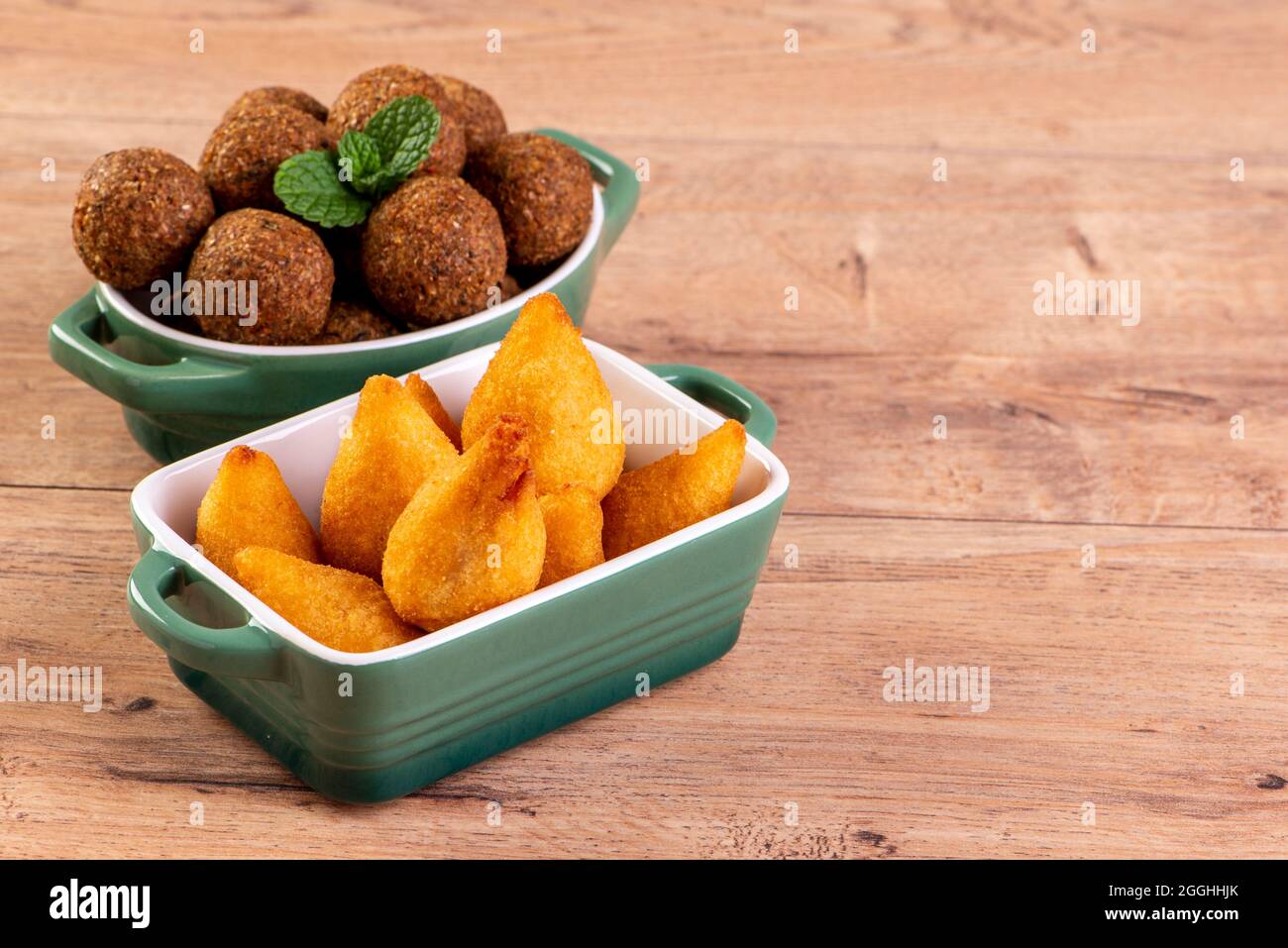 Brazilian fried savory snack mix with coxinha and fried kibbeh Stock ...