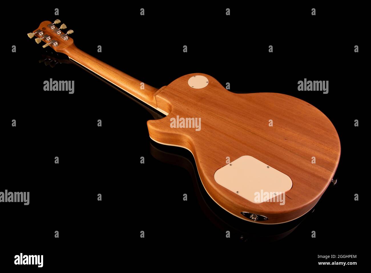 back part of the body of an electric guitar on black background Stock ...