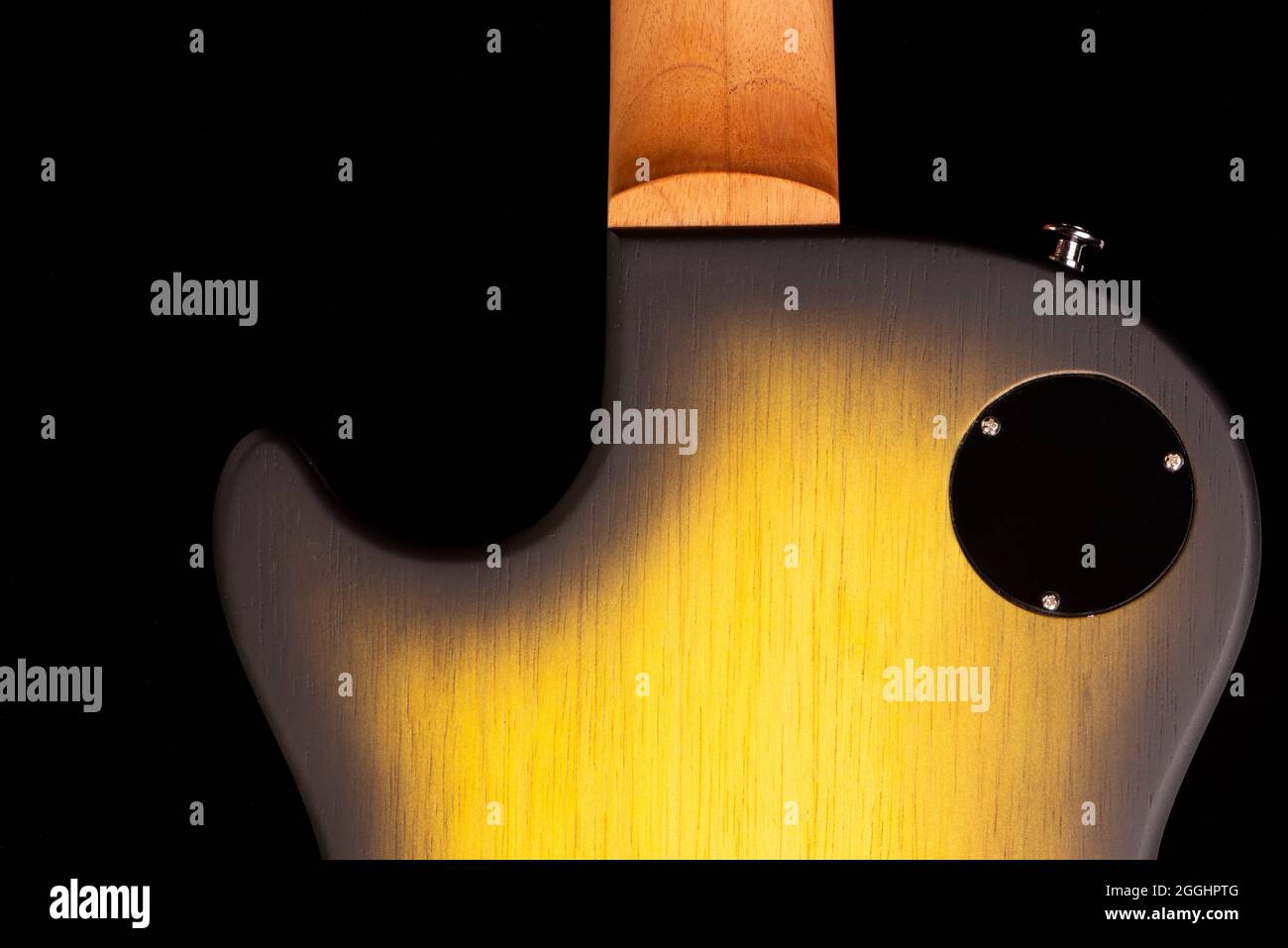 back part of the body of an electric guitar on black background Stock ...
