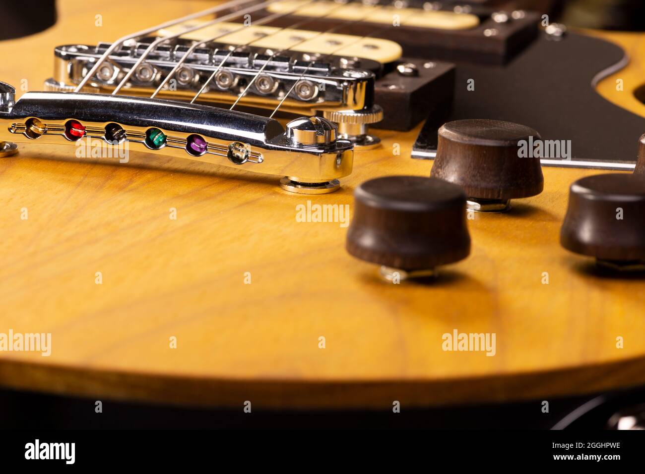 front part of the body of an electric guitar on black background Stock ...