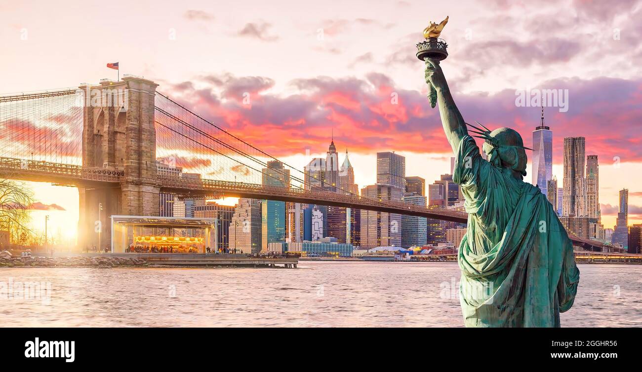 Statue Liberty and New York city skyline at sunset, in United States ...
