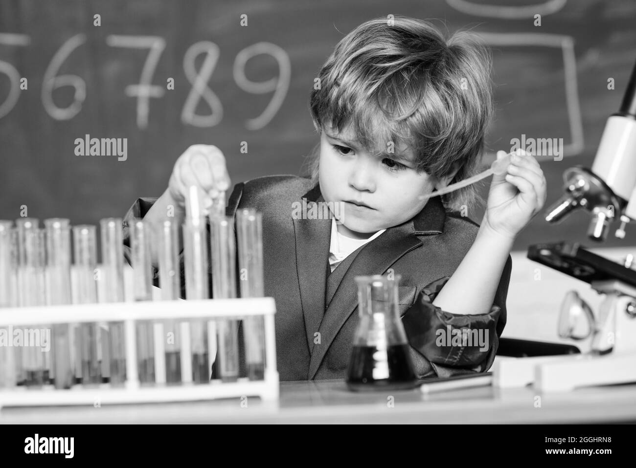 chemistry lab. Back to school. kid in lab coat learning chemistry ...