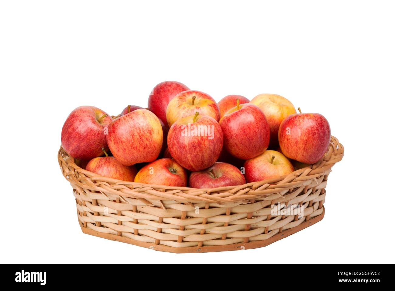 red apples in wicker basket on isolated white background Stock Photo ...
