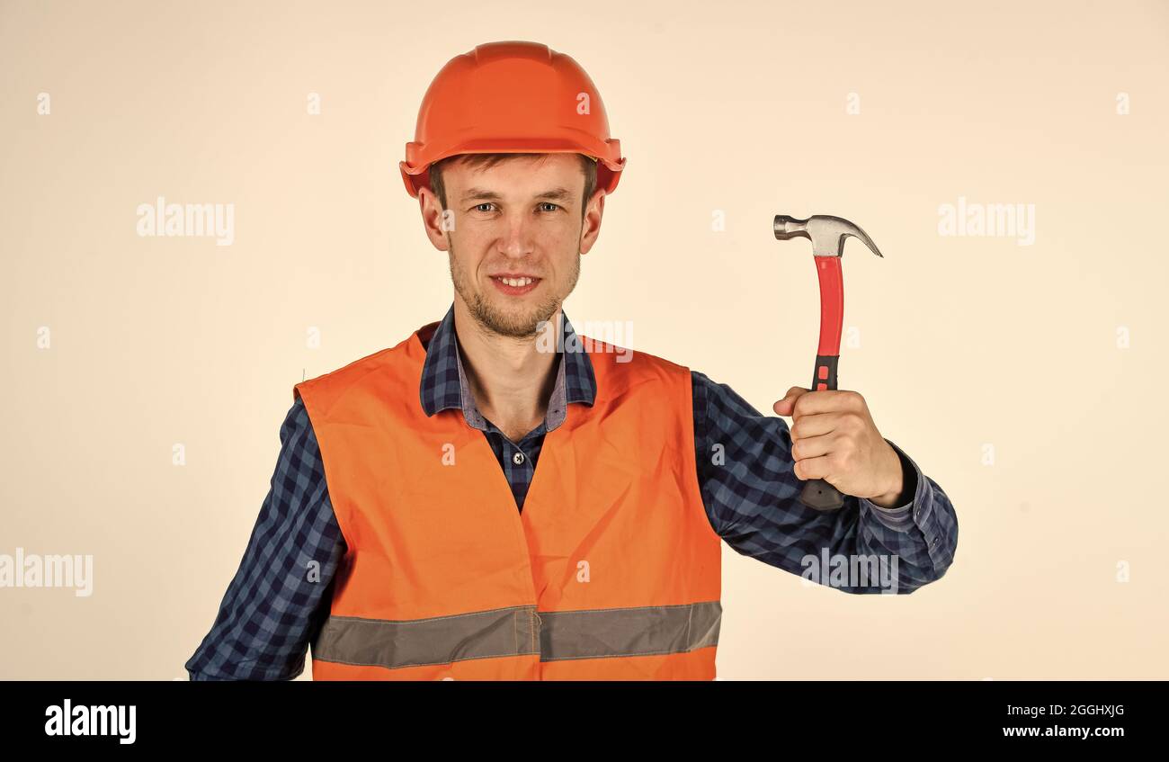 young worker is engineer assistant. repairman in uniform. man work with ...