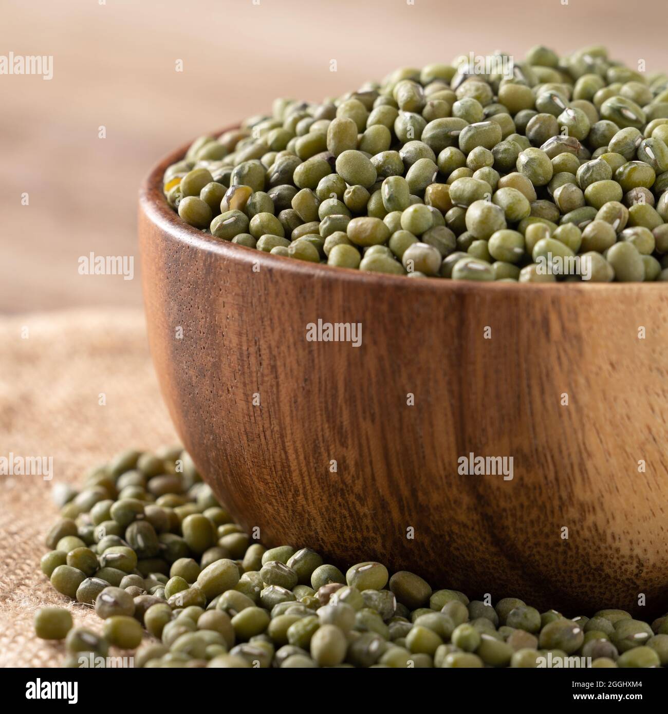 Close up of raw mung bean in a bowl on wooden table background Stock ...