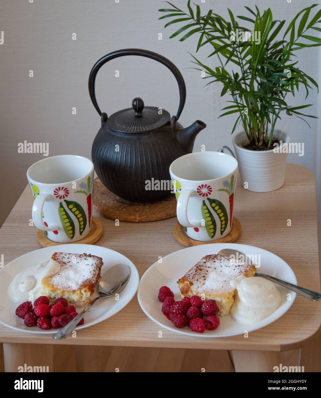 Closeup. Swedish cheese cake with fresh raspberry and whipped cream on ...